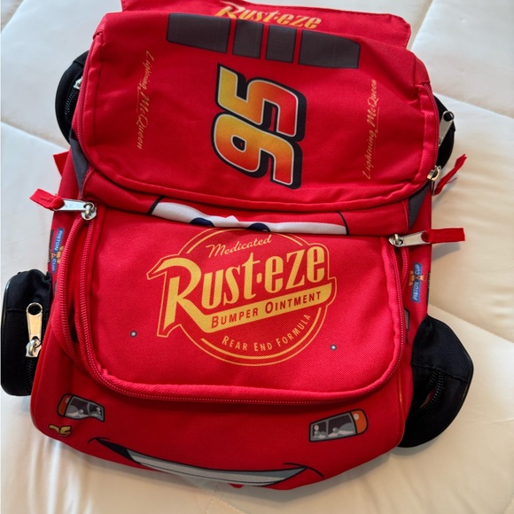 None | Accessories | Red And Yellow Cars Backpack With Rusteze Branding ...